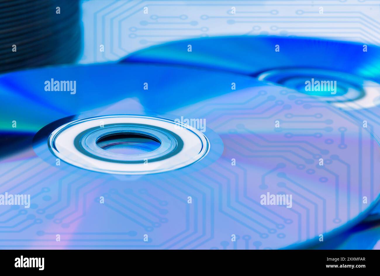 Closeup of a stack compact discs (CD/DVD) with the circuit board Stock ...