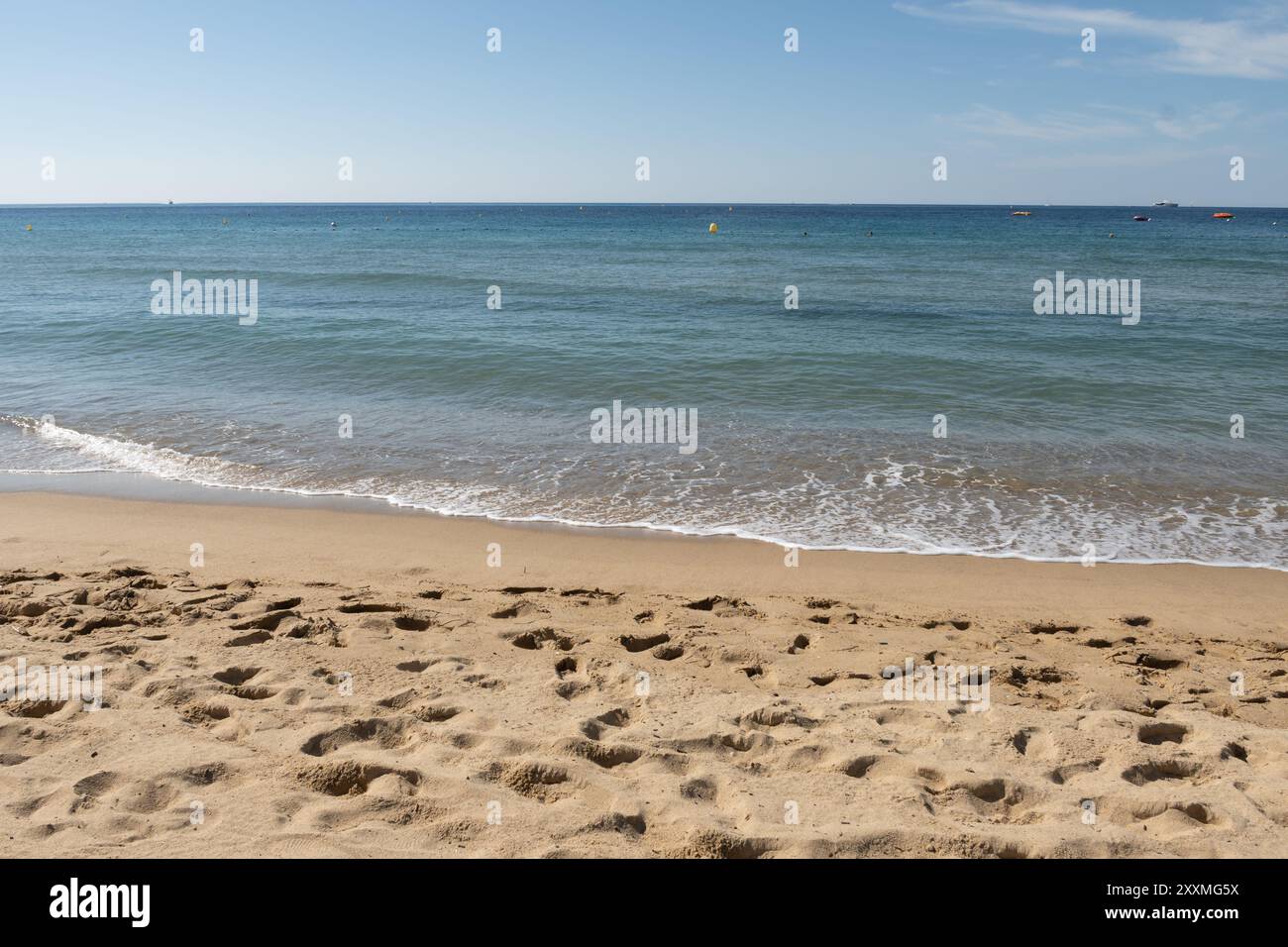 Morning view on crystal clear blue water and boats on Plage du ...