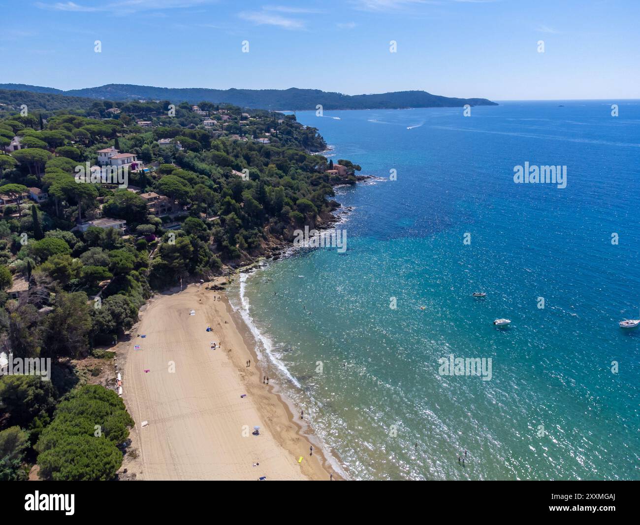 Aerial view on boats, crystal clear blue water of Plage du Debarquement ...