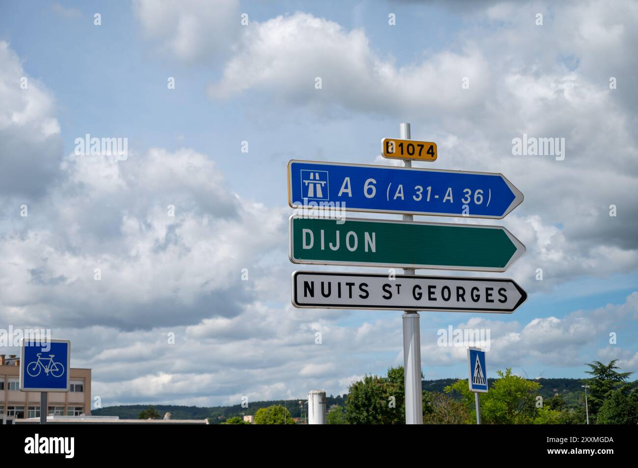 Driving in summer on road, signs direction to Dijon, Beaune and other ...