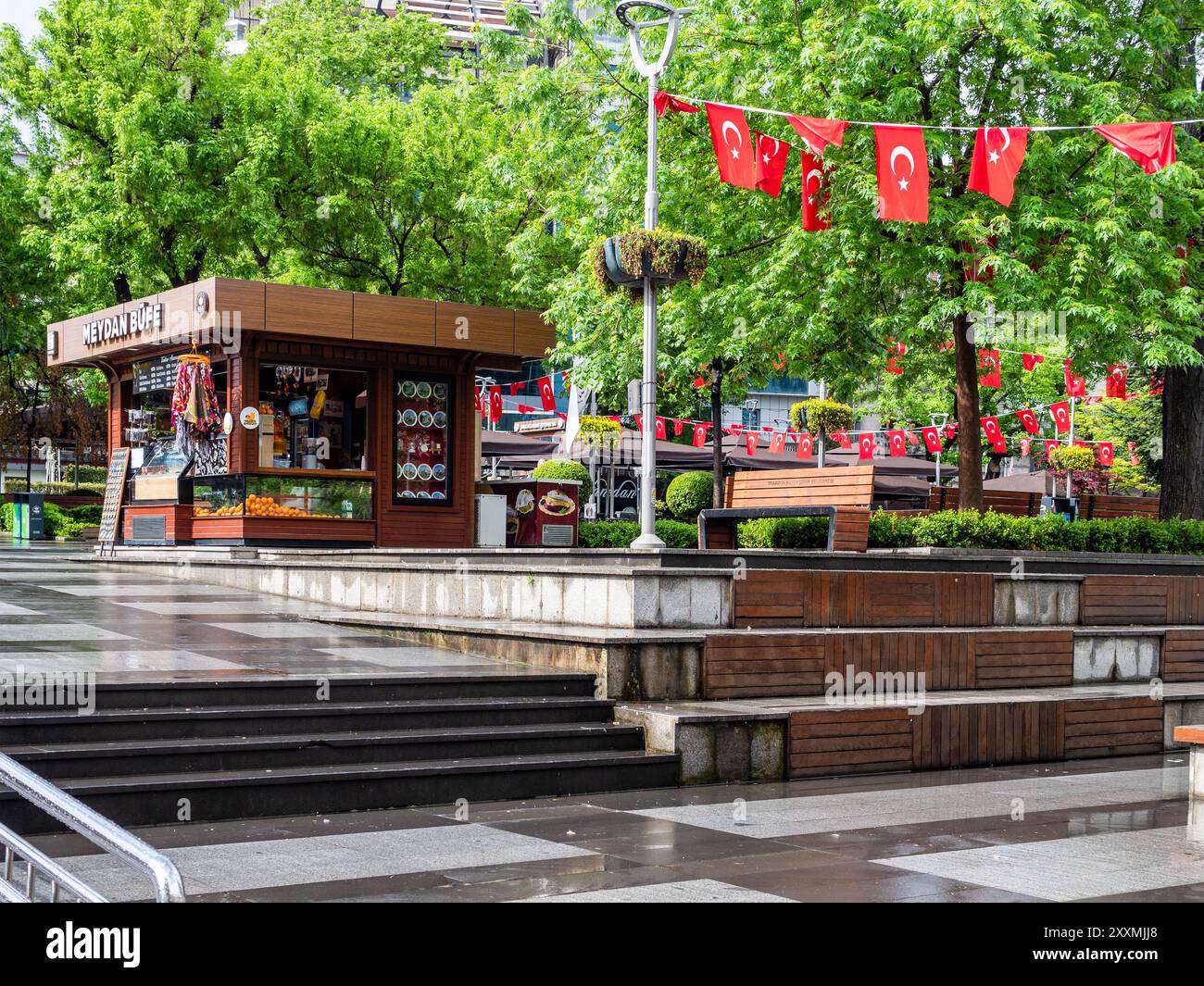 Trabzon, Turkey - May 5, 2024: wet pavement in green park on Meydan ...