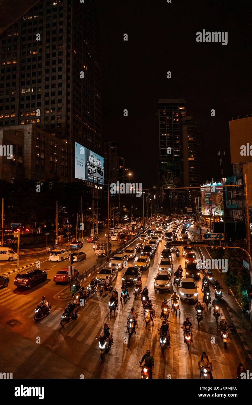 night city scenery in Bangkok and the pulsating life on the streets ...