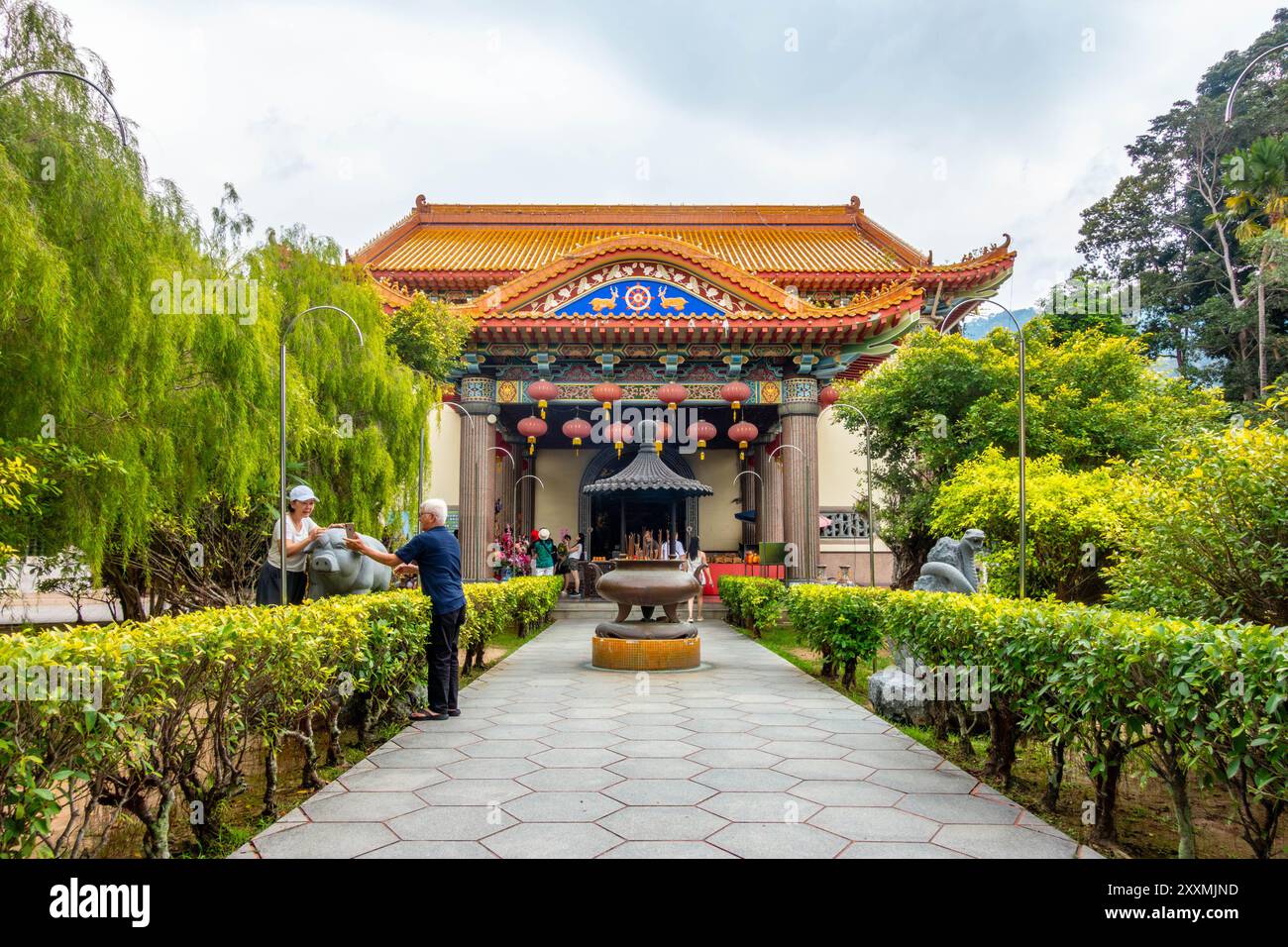View along a path through a garden approaching one of the colourful ...