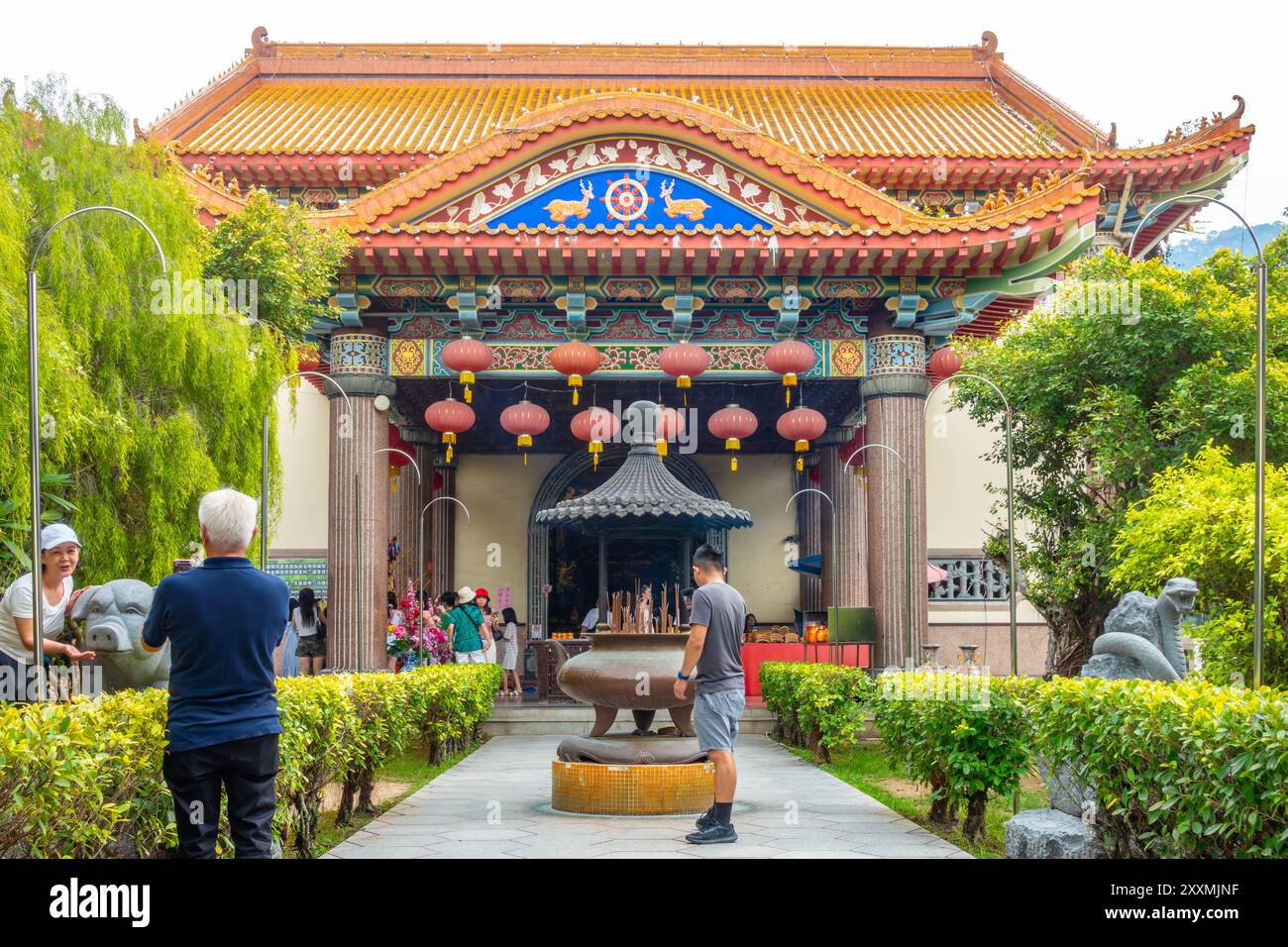 View along a path through a garden approaching one of the colourful ...