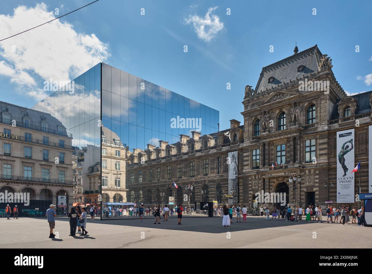 Wall of mirrors by architect Jean Nouvel surround the construction work ...