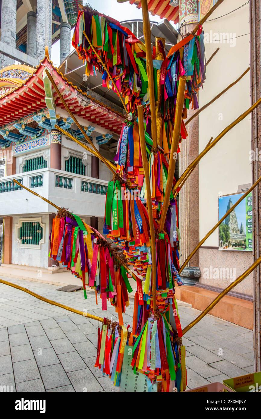 Coloured ribbons, each one representing a prayer on a prayer tree in ...