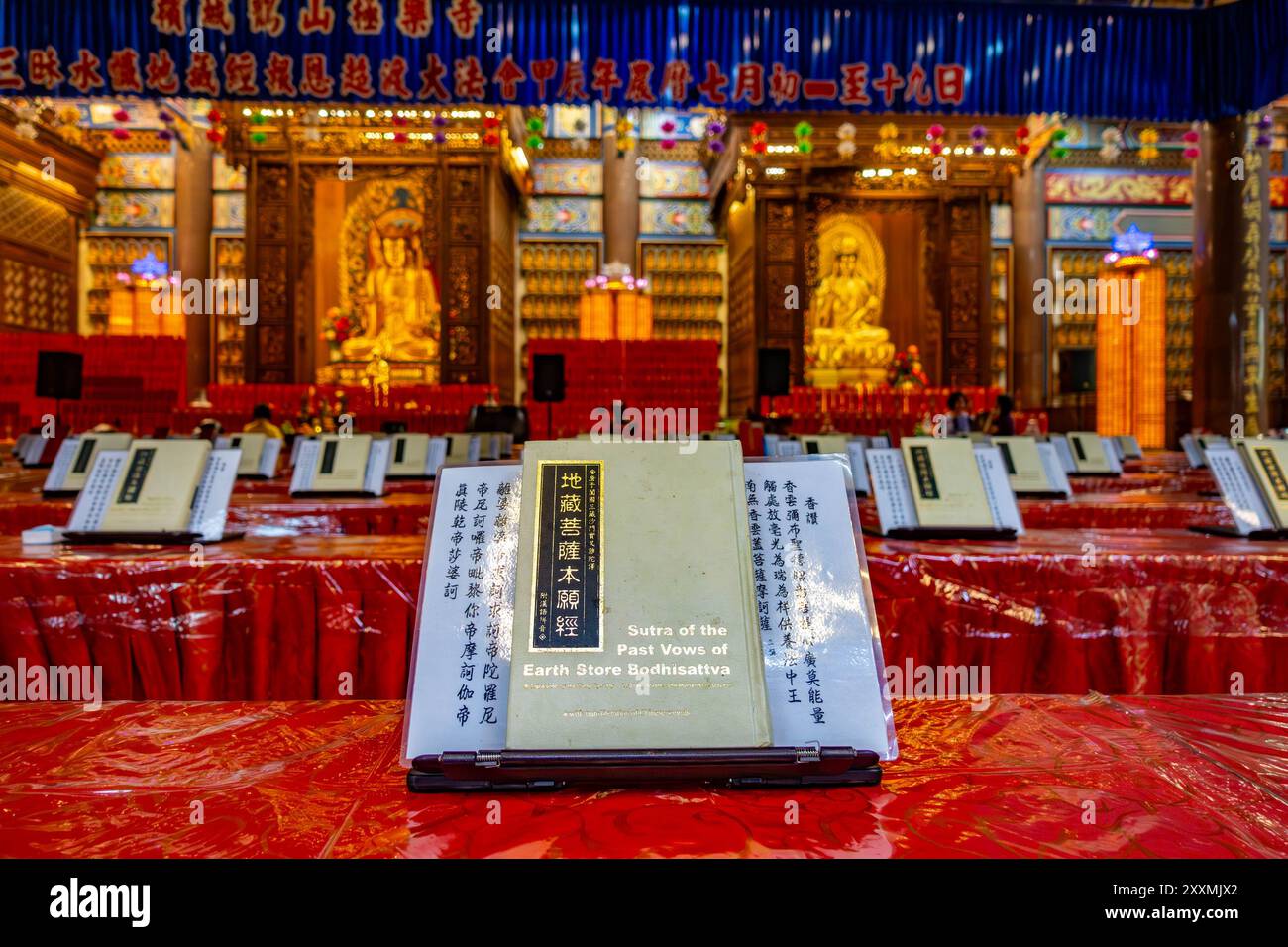 Rows of prayer books setup for worshippers in the main prayer hall at ...