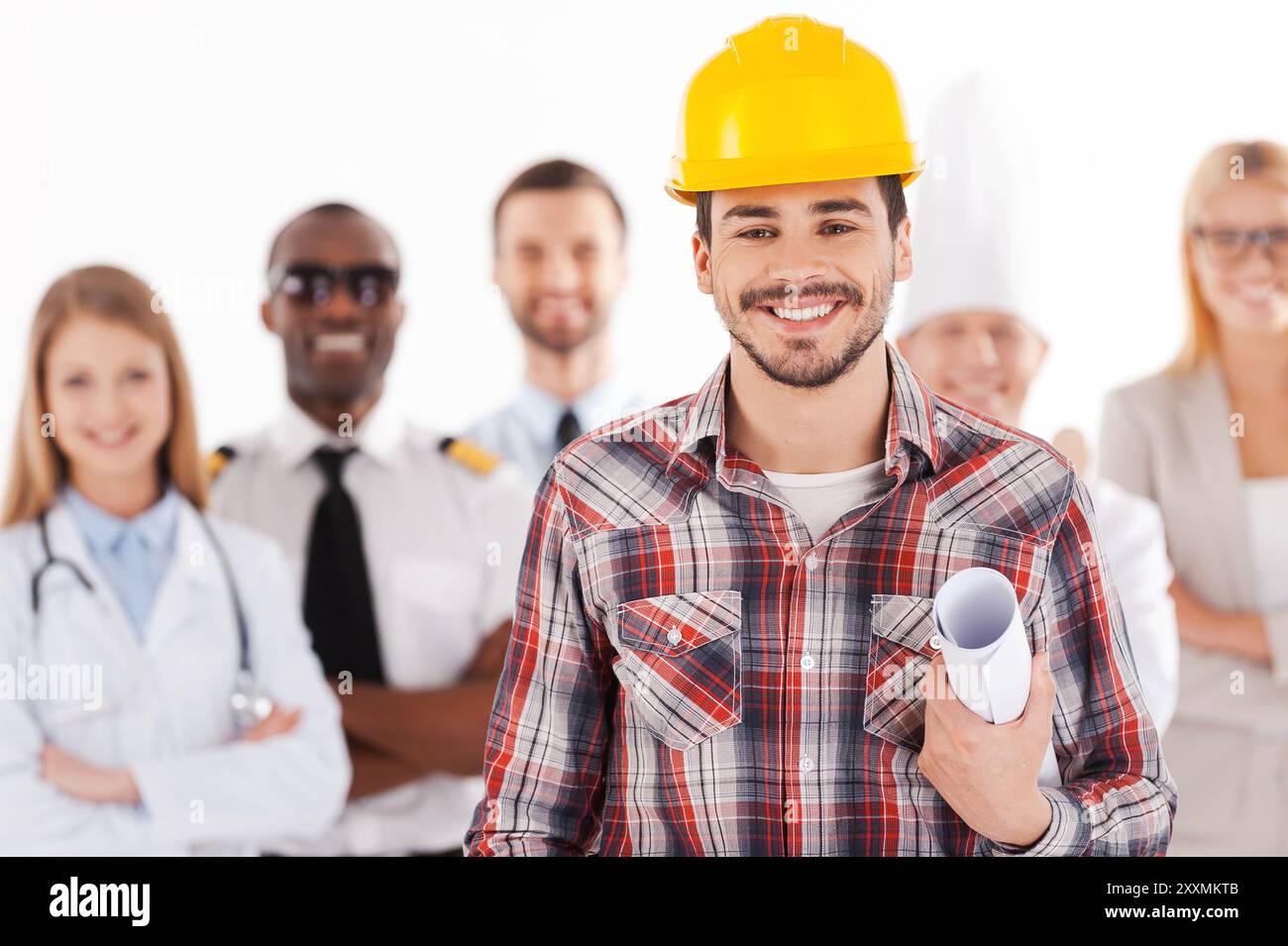 When I grow up I will be an engineer. Confident young man in hardhat ...