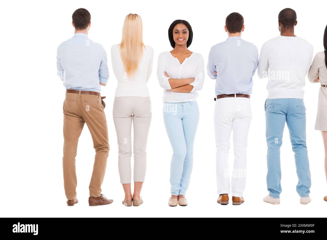 Now it is my turn. Rear view of group of people standing in a row and ...