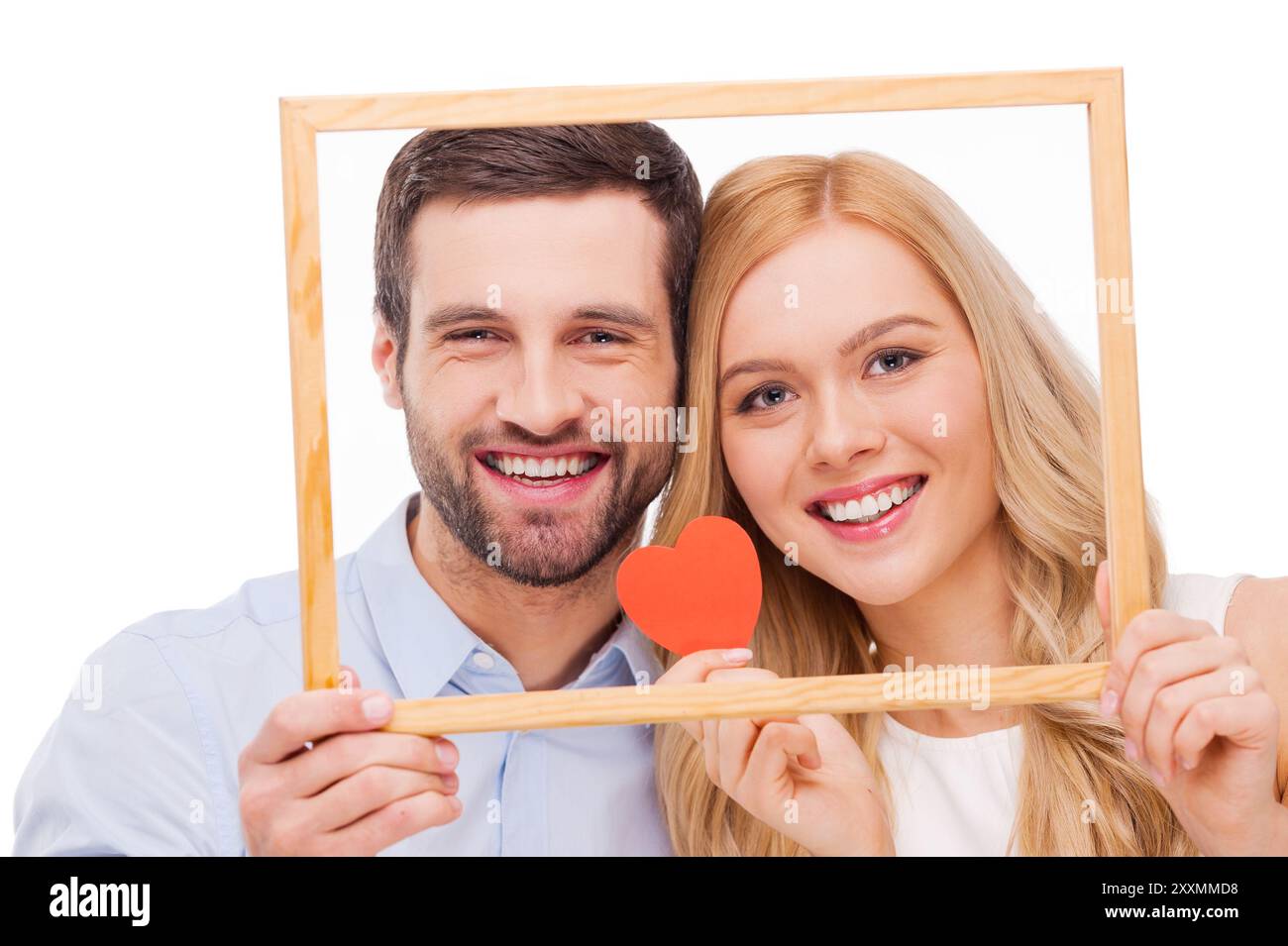 Celebrating their love. Beautiful young loving couple bonding to each ...