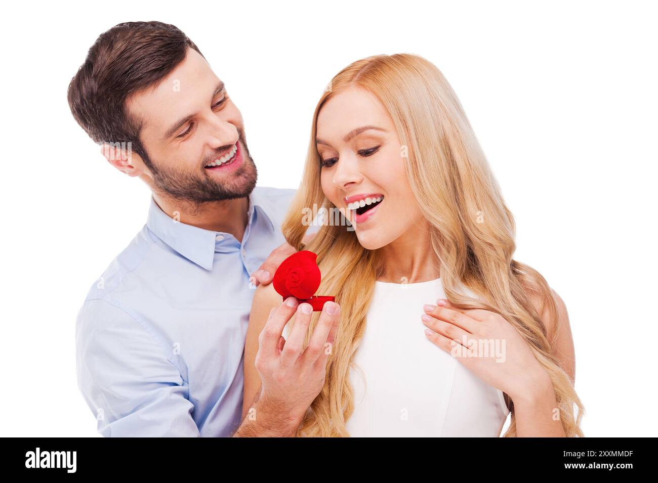 Celebrating their love. Beautiful young loving couple bonding to each ...