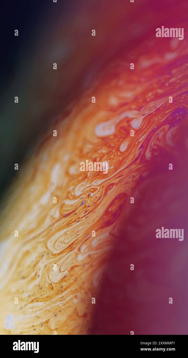 Chemical fluid. Bubble liquid. Defocused pink orange color fizzy ...