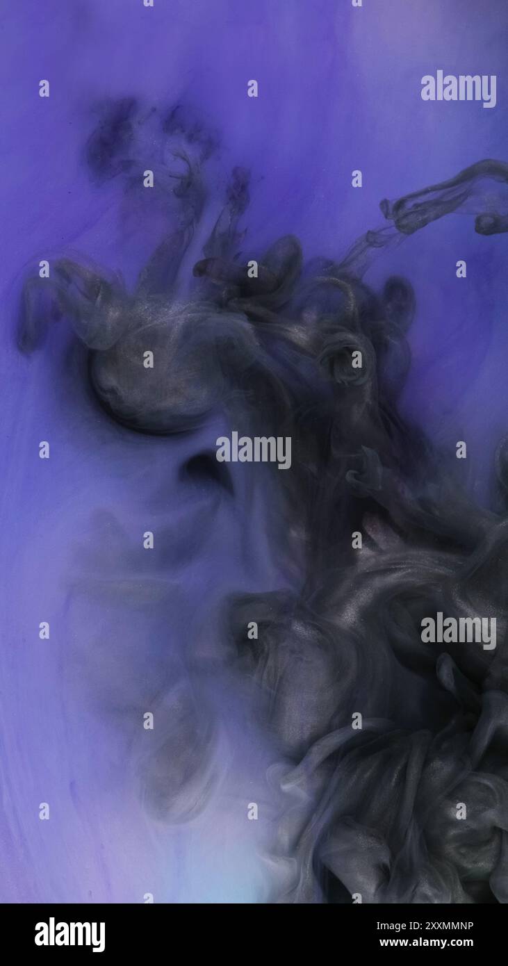 Mist floating. Paint water mix. Defocused purple black silver color ...