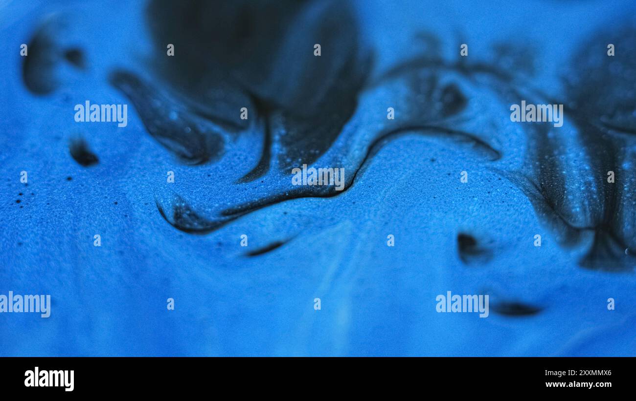 Sparkling paint mix. Glitter spill. Blur black blue color shimmering ...