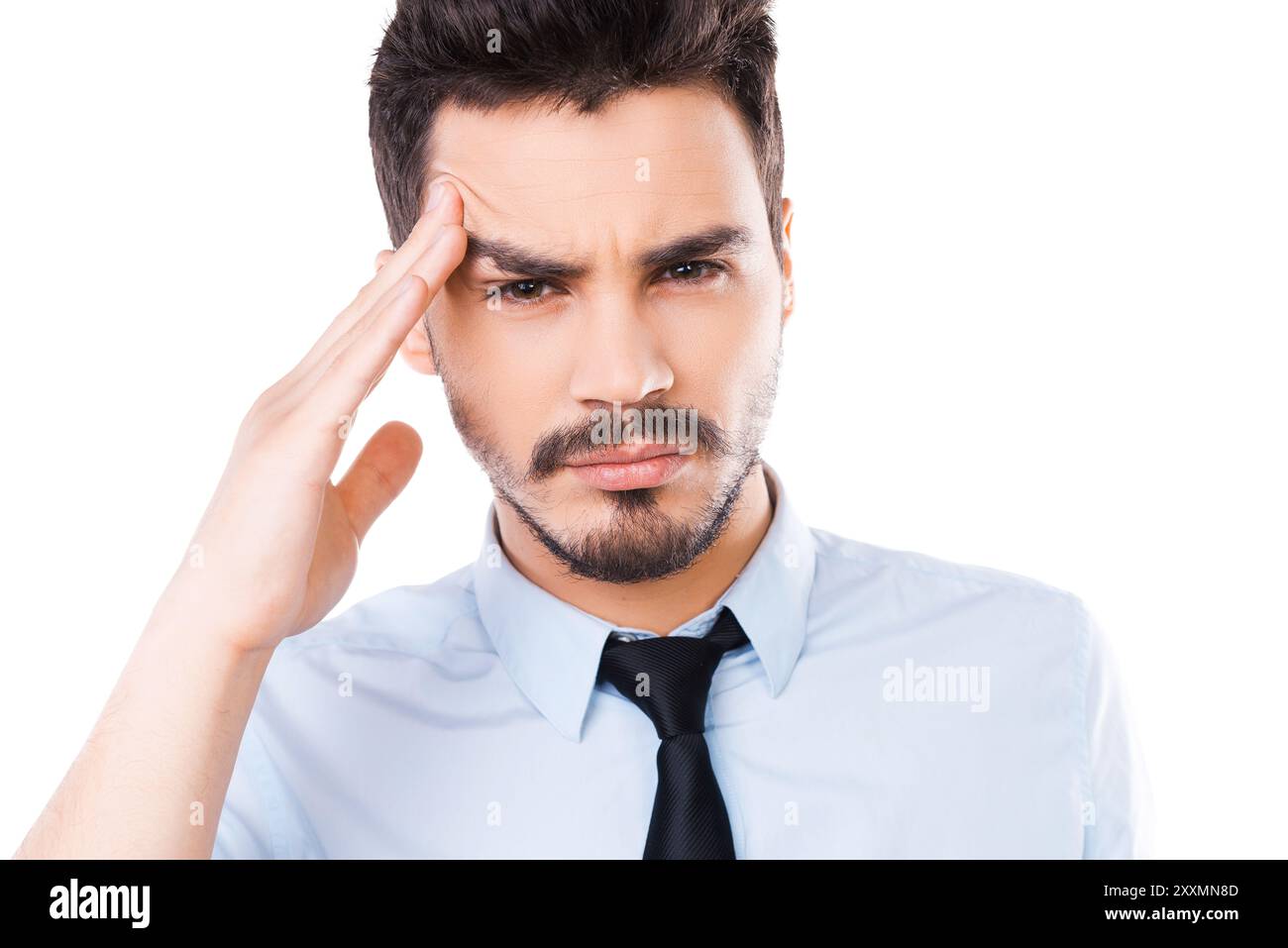 This awful headache. Frustrated young man in shirt and tie touching his ...