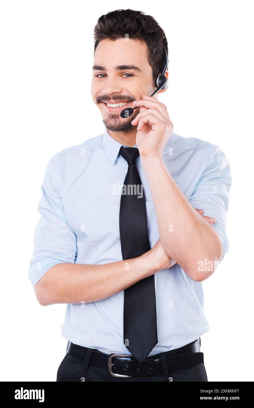 How may I help you? Handsome young male operator adjusting his headset ...