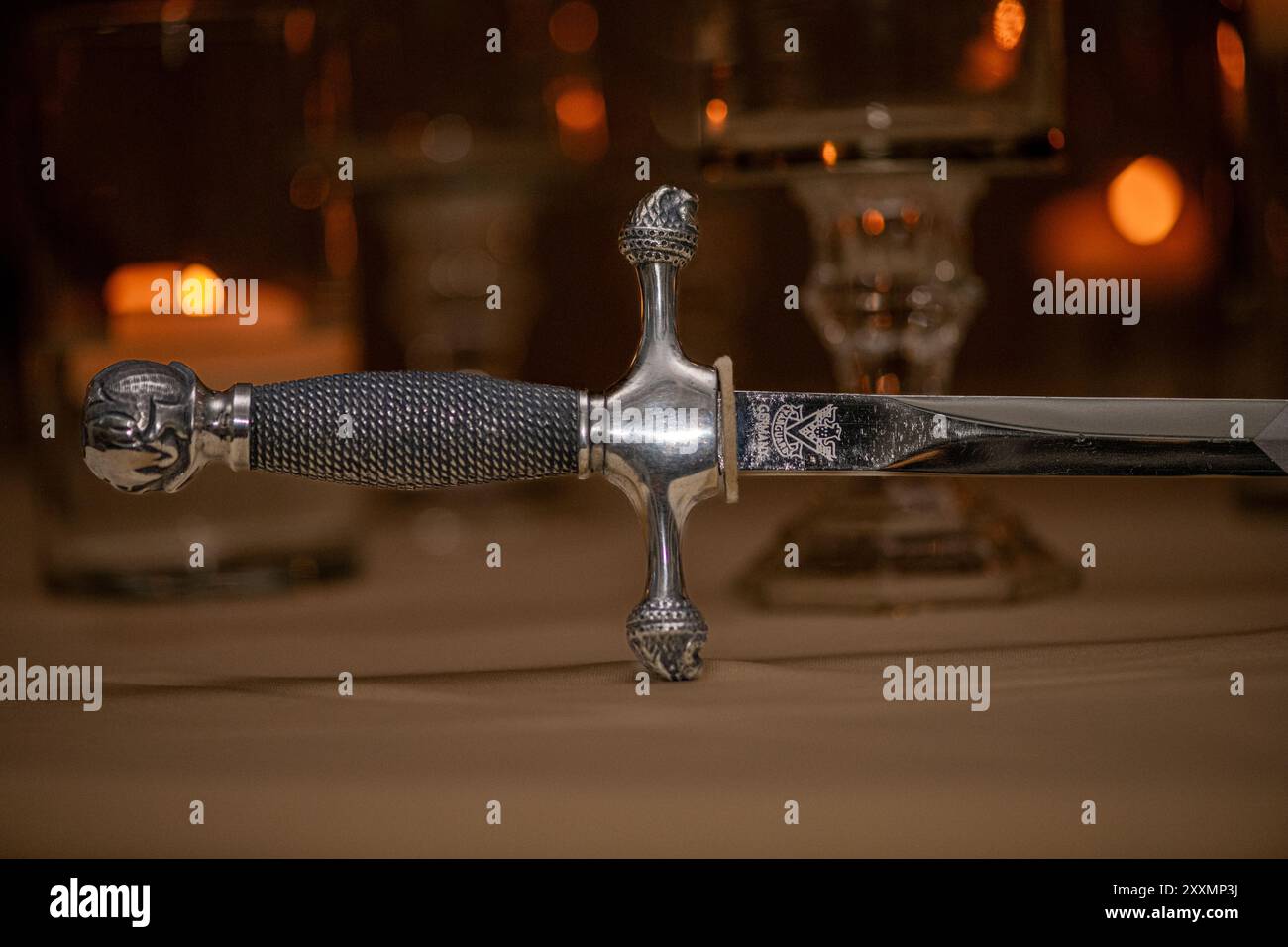 Silver medieva katana sword with rope pattern handle and ornate designs ...