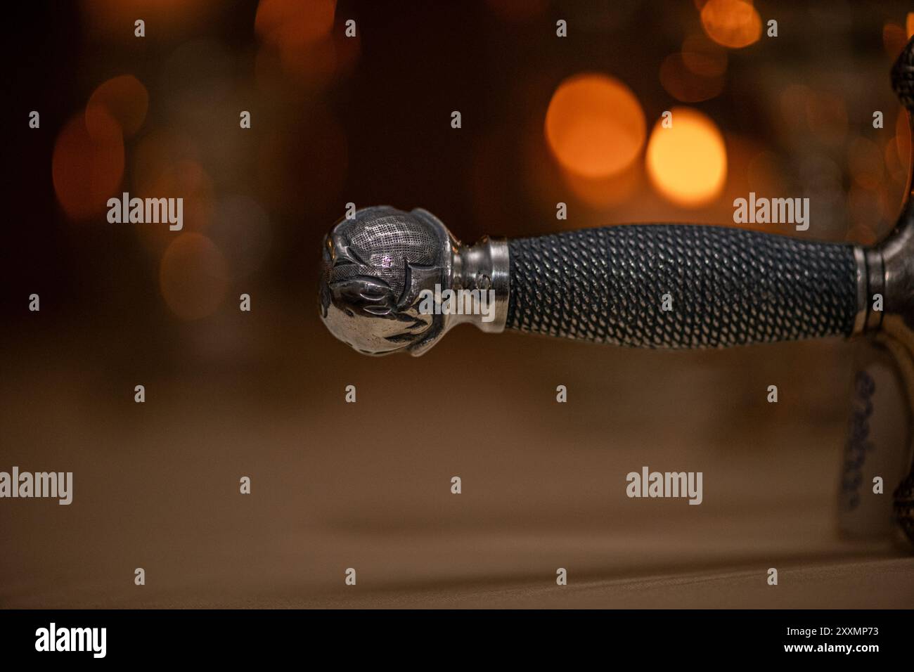 Silver medieva katana sword Handle with rope pattern and ornate designs ...