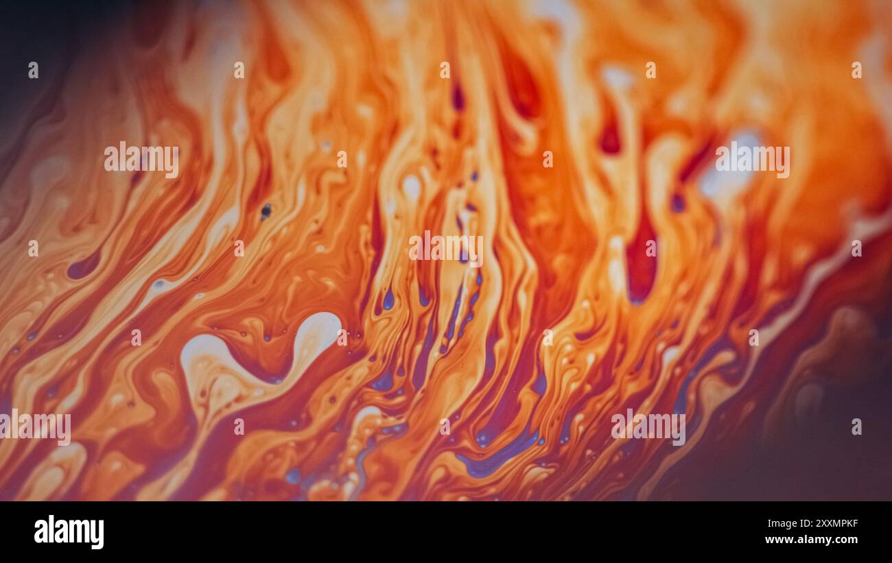 Defocused acid fluid. Ink blend. Orange blue color chemical bubbles ...