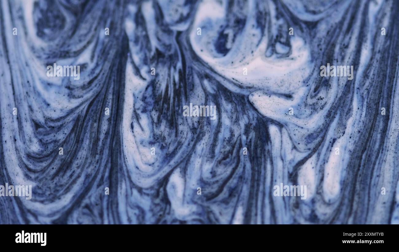Paint flow. Marble ink. Defocused blue white color dripping dense layer ...