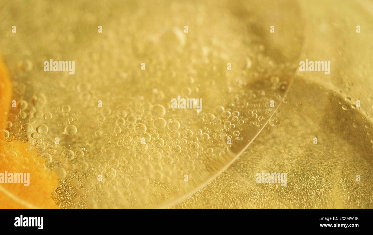 Oil bubbles. Golden ink. Defocused yellow color translucent sparkling ...