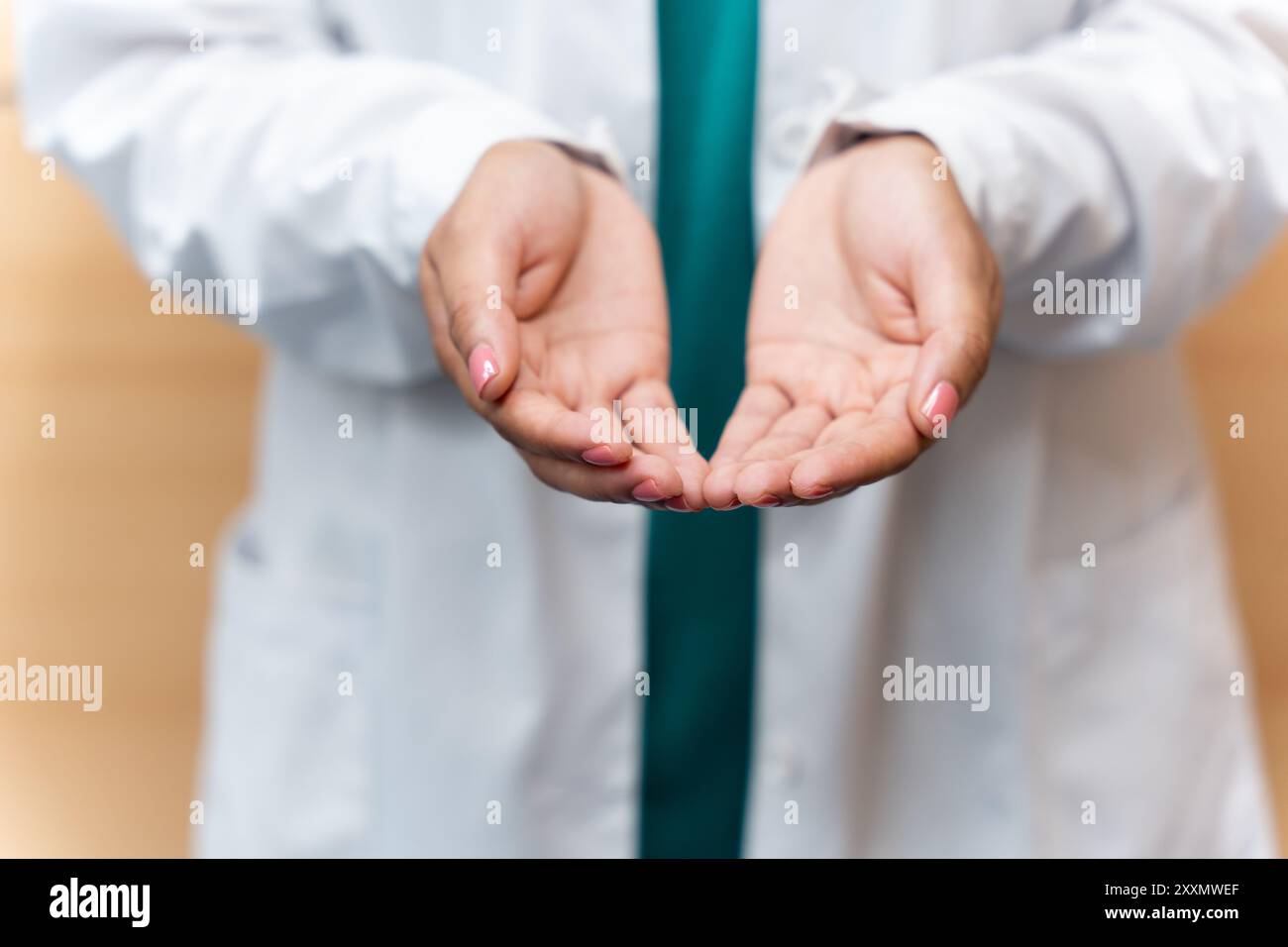 Doctor's hands in a welcoming gesture, empathy towards the patient and ...