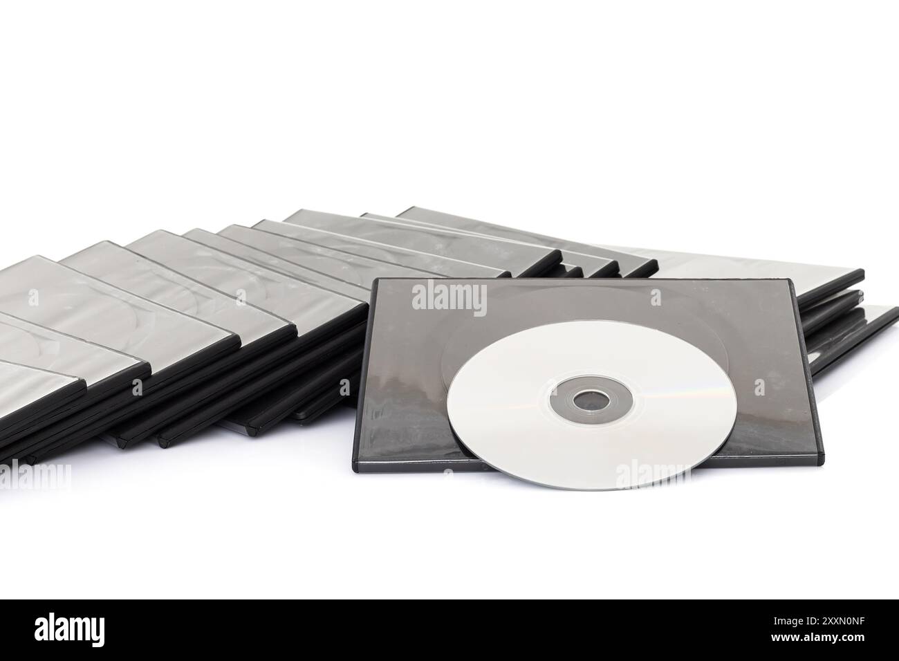 DVD boxes with disc on white background Stock Photo - Alamy