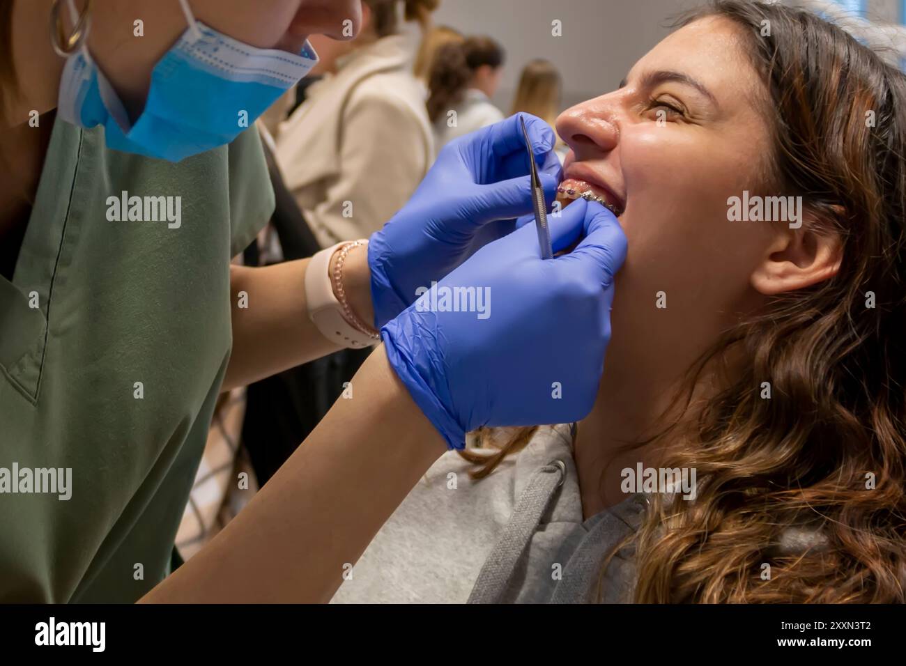Installation process temporary tooth in self-ligating braces for a ...