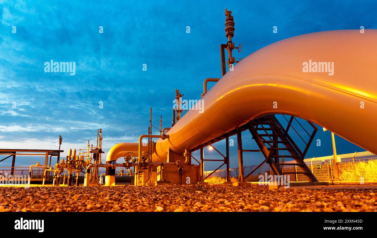 View of the natural gas pipeline exiting the ground to the receiving ...