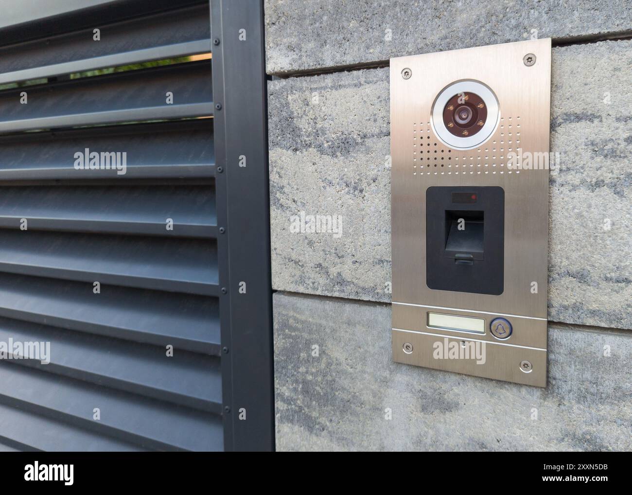 Stainless Steel Intercom on Concrete Wall Stock Photo - Alamy