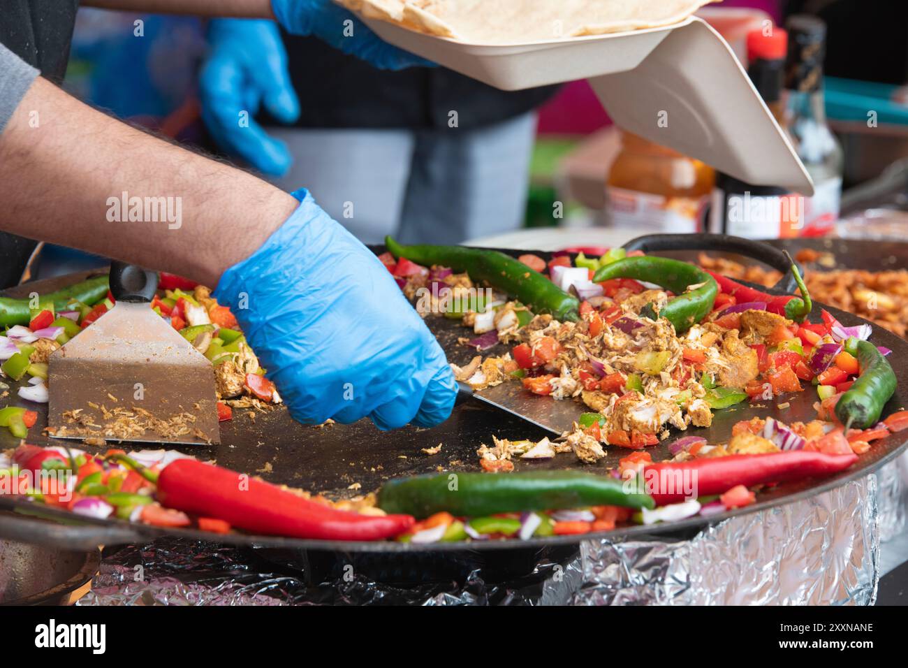 Food being prepared at stall Stock Photo - Alamy