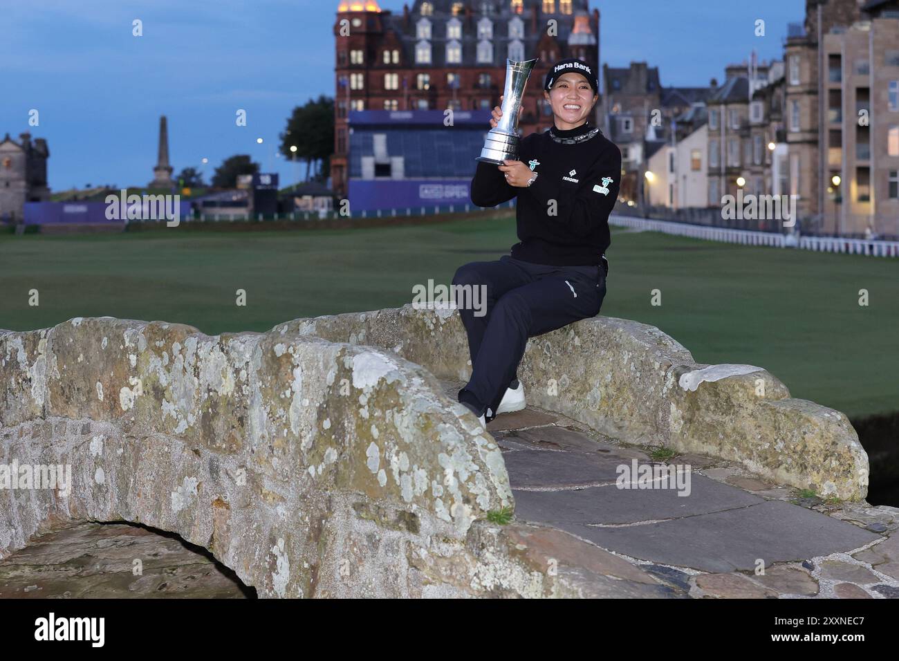 Lydia Ko poses for photos with the trophy on Swilcan Bridge after ...