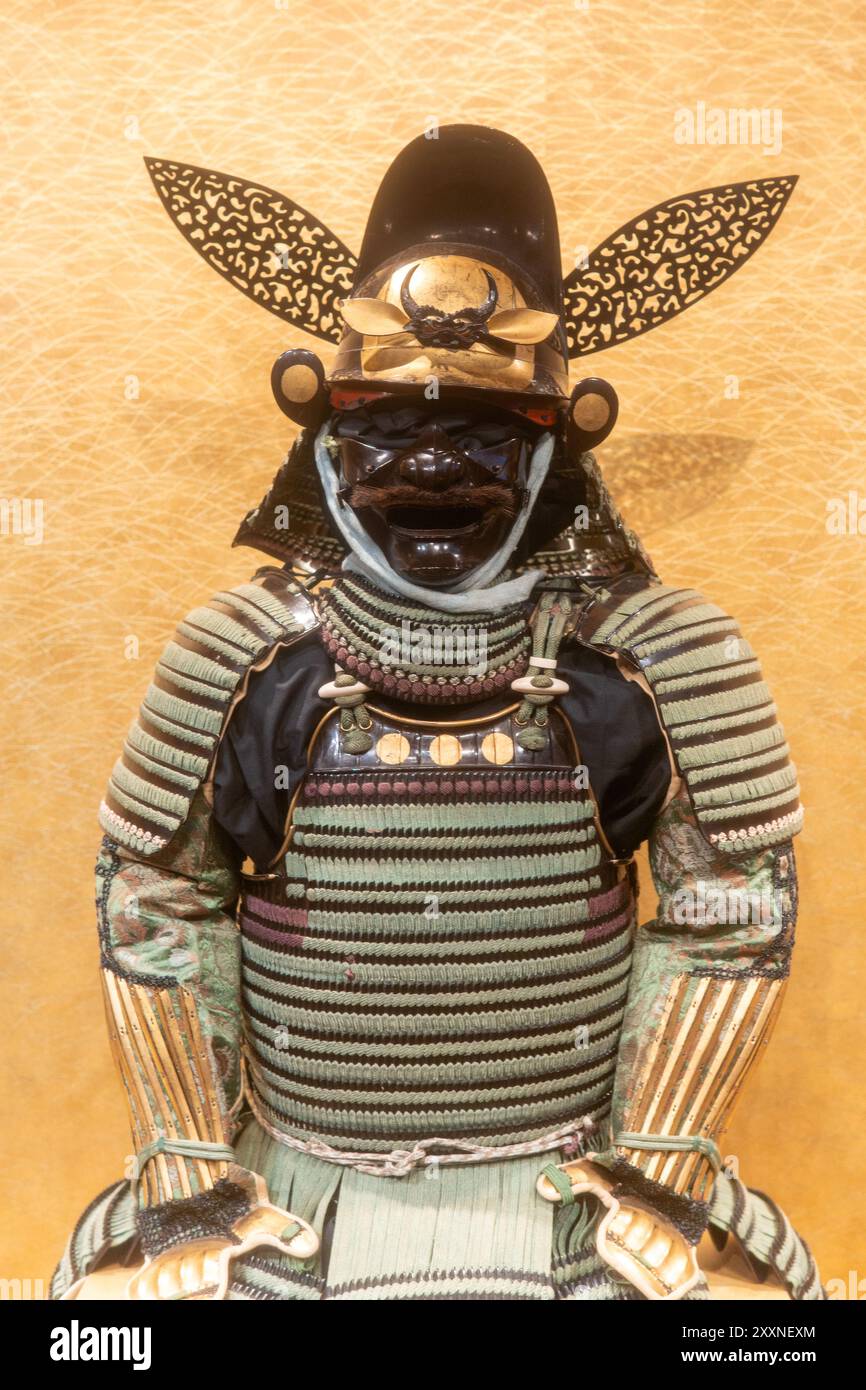 A collection of intricately detailed Japanese samurai armor suits ...