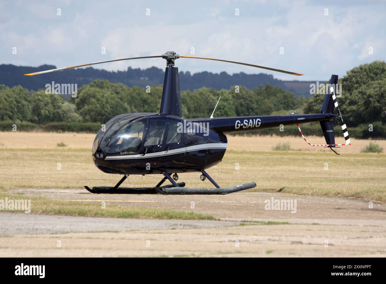 A Robinson R44 Clipper II helicopter at Headcorn Aerodrome in Kent ...