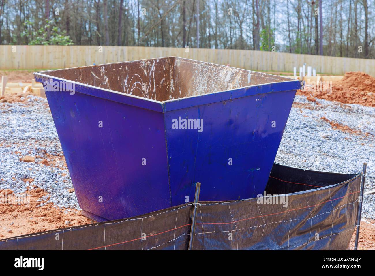 Use of metal containers on construction site as means collecting waste ...