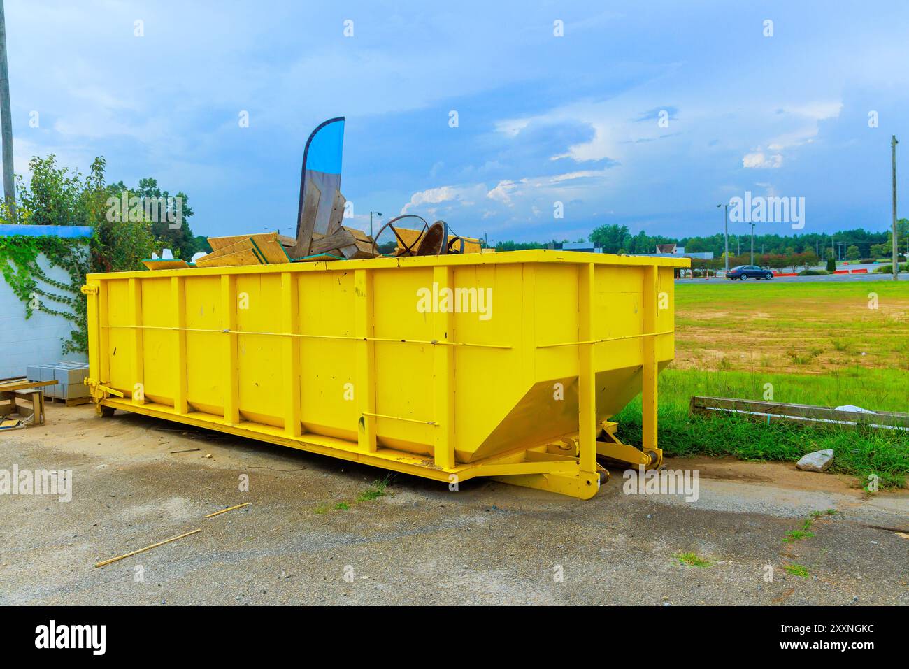 Construction site dumpsters of metal containers for collection of waste ...