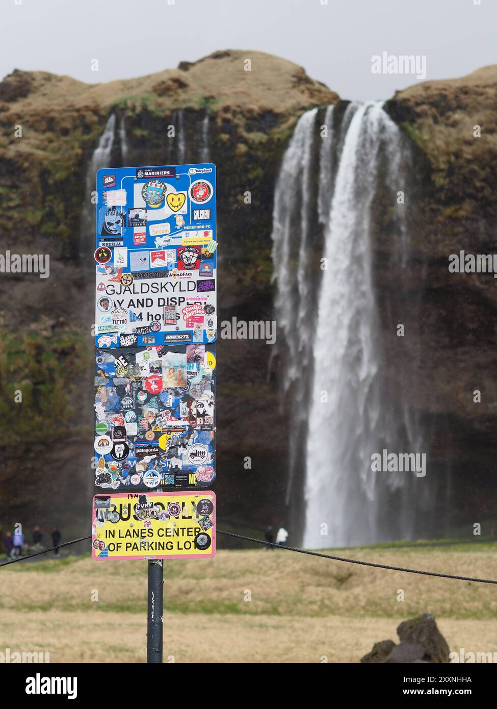 Seljalandsfoss, Iceland - May 17 2024: A vibrant sign covered in ...