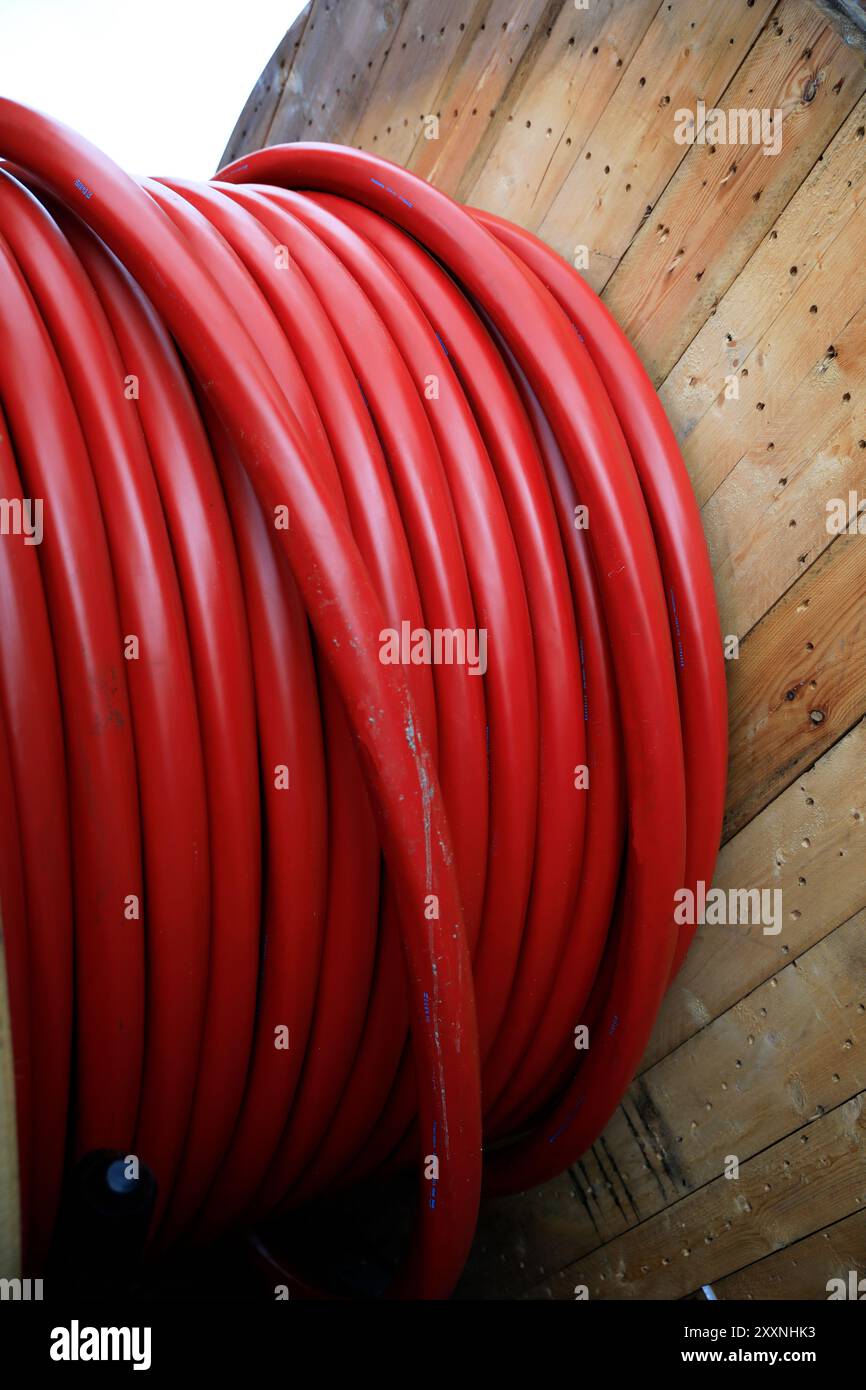 Installation of a high voltage cable in a residential area, The ...