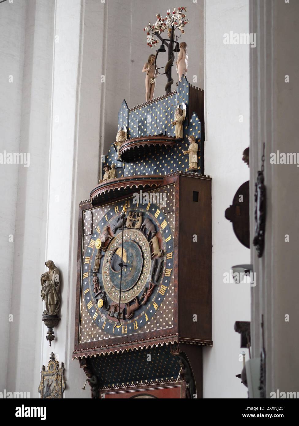 Gdansk, Poland - July 13, 2024: This image features an ancient clock ...