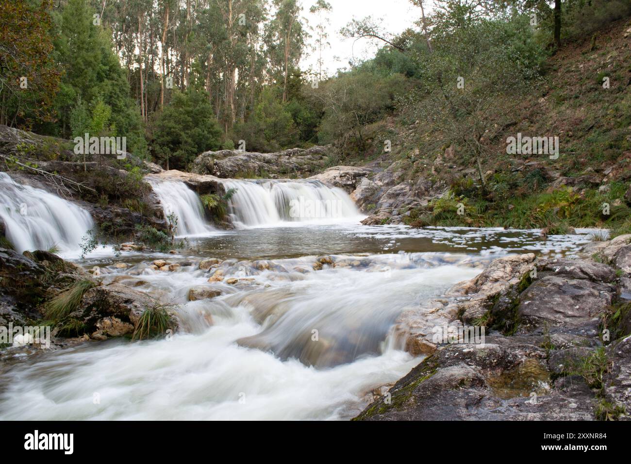 Beautiful view of the waterfalls in the natural pool of Loureza. Oia ...