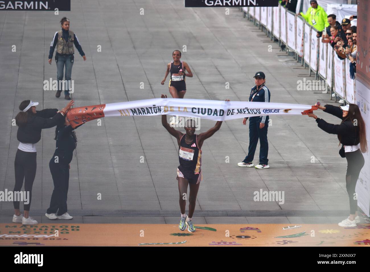 Fancy Chemutai of Kenya crossing the finish line in women’s first place ...