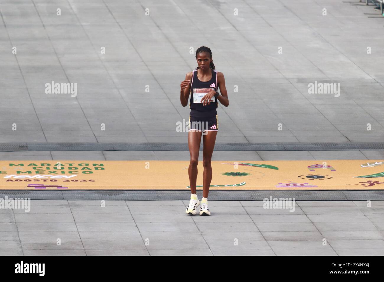Janet Ruguru Gichumbi of Kenya crossing the finish line in women’s ...