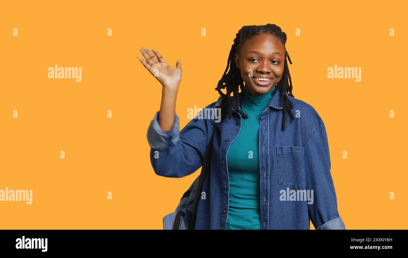 Portrait of happy woman waving hand, saluting, gesturing, isolated over ...