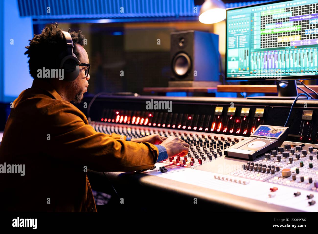 Sound designer editing recording hi-res stock photography and images ...