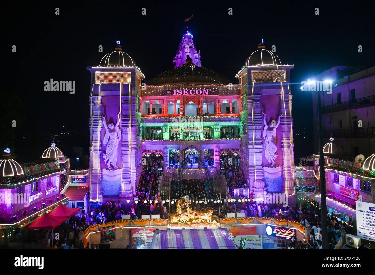 NOIDA, INDIA - AUGUST 25: ISKCON temple in Sector 33 lit up on the eve ...