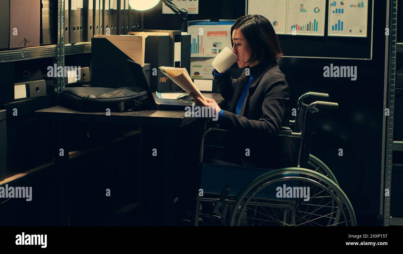 Investigator reading criminology files hi-res stock photography and ...