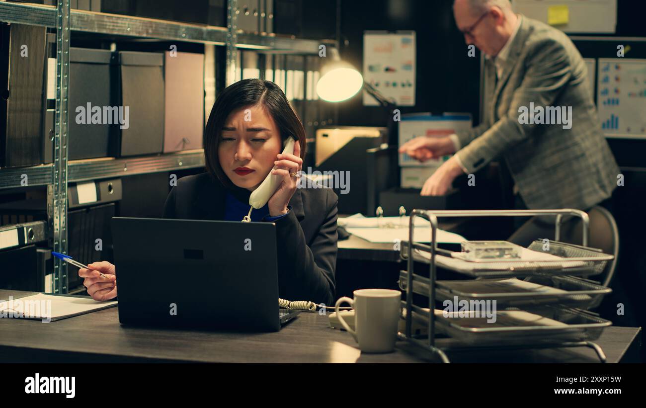 Federal agent checks phone hi-res stock photography and images - Alamy