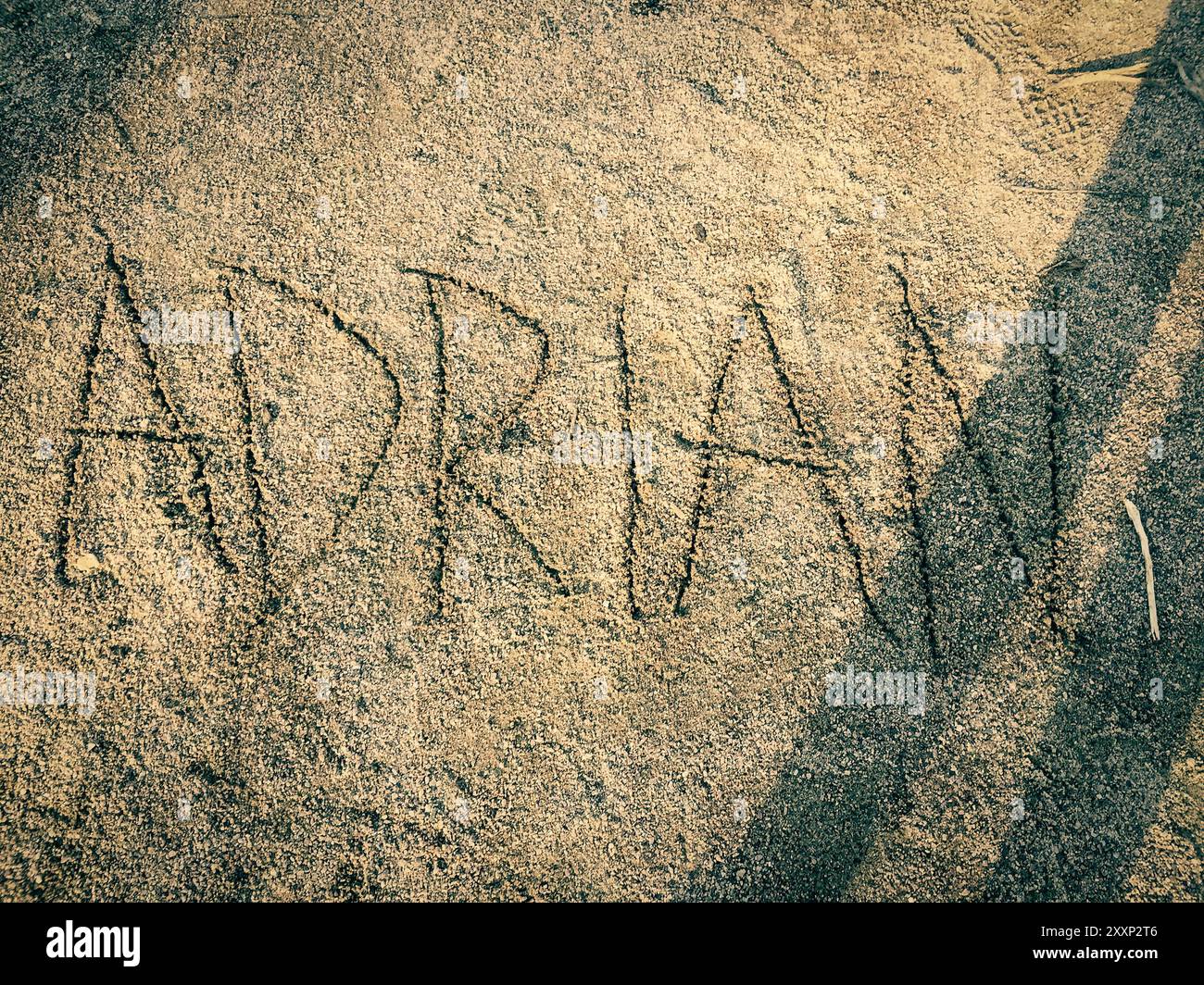 The name Adrian written in frozen sand Stock Photo - Alamy