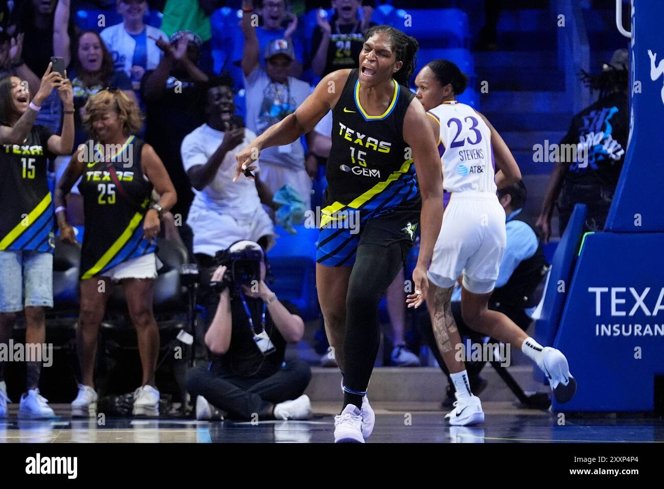 Dallas Wings center Teaira McCowan (15) reacts after scoring a go-ahead ...