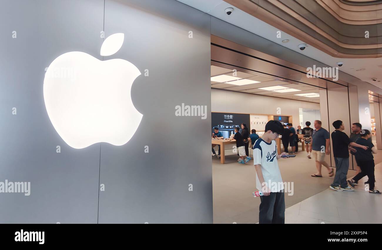 SHANGHAI, CHINA - AUGUST 22, 2024 - Students experience Apple products ...